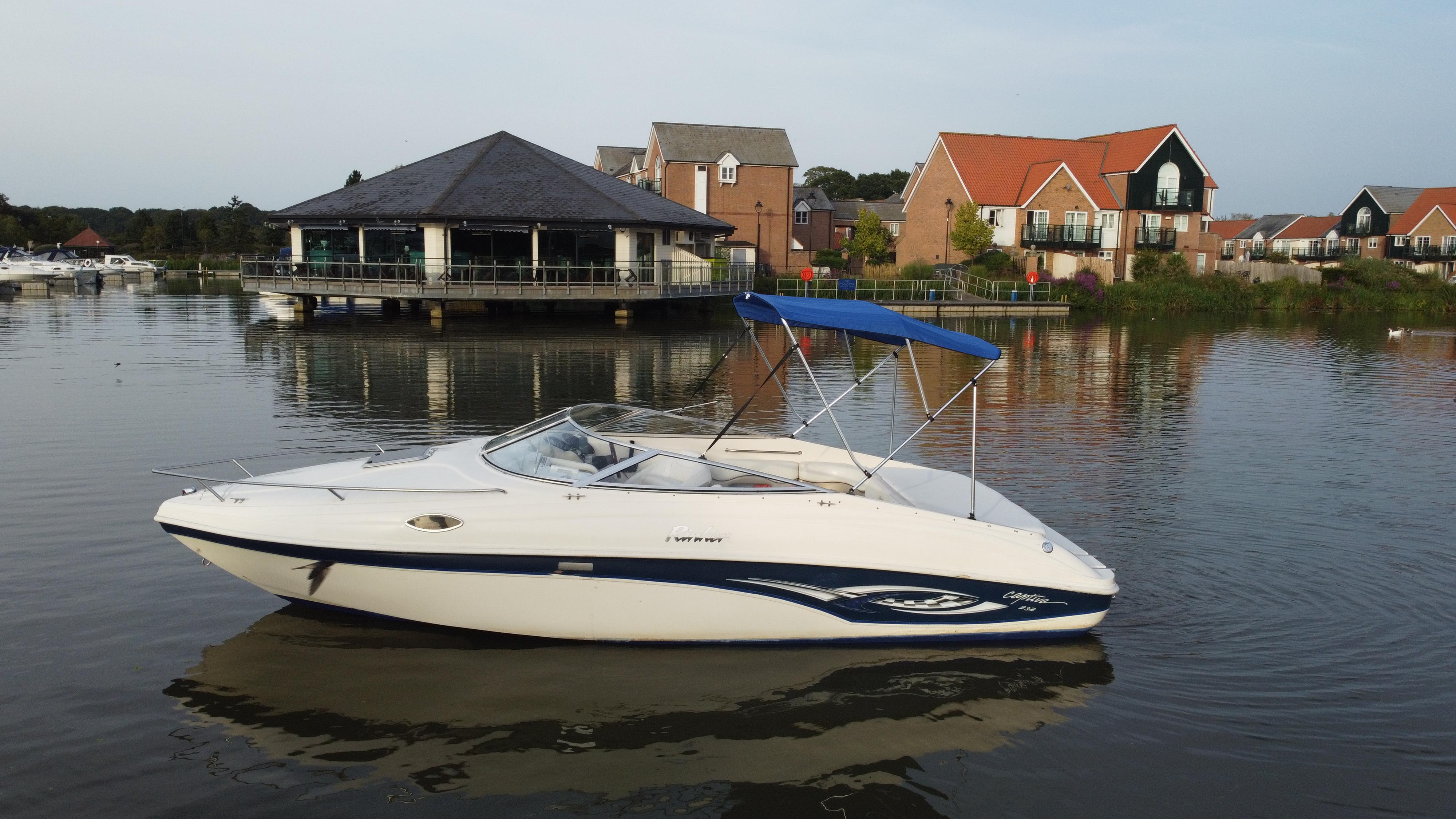 Rinker 232 Captiva Cuddy 9012569 – Burton Waters Boat Sales